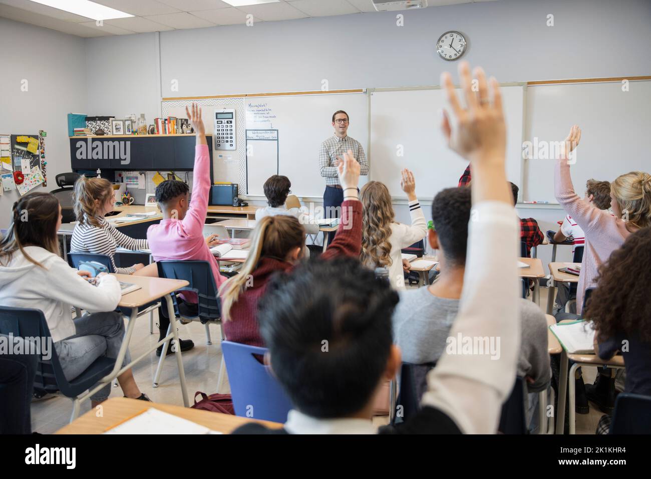 Hands together raised hi-res stock photography and images - Alamy