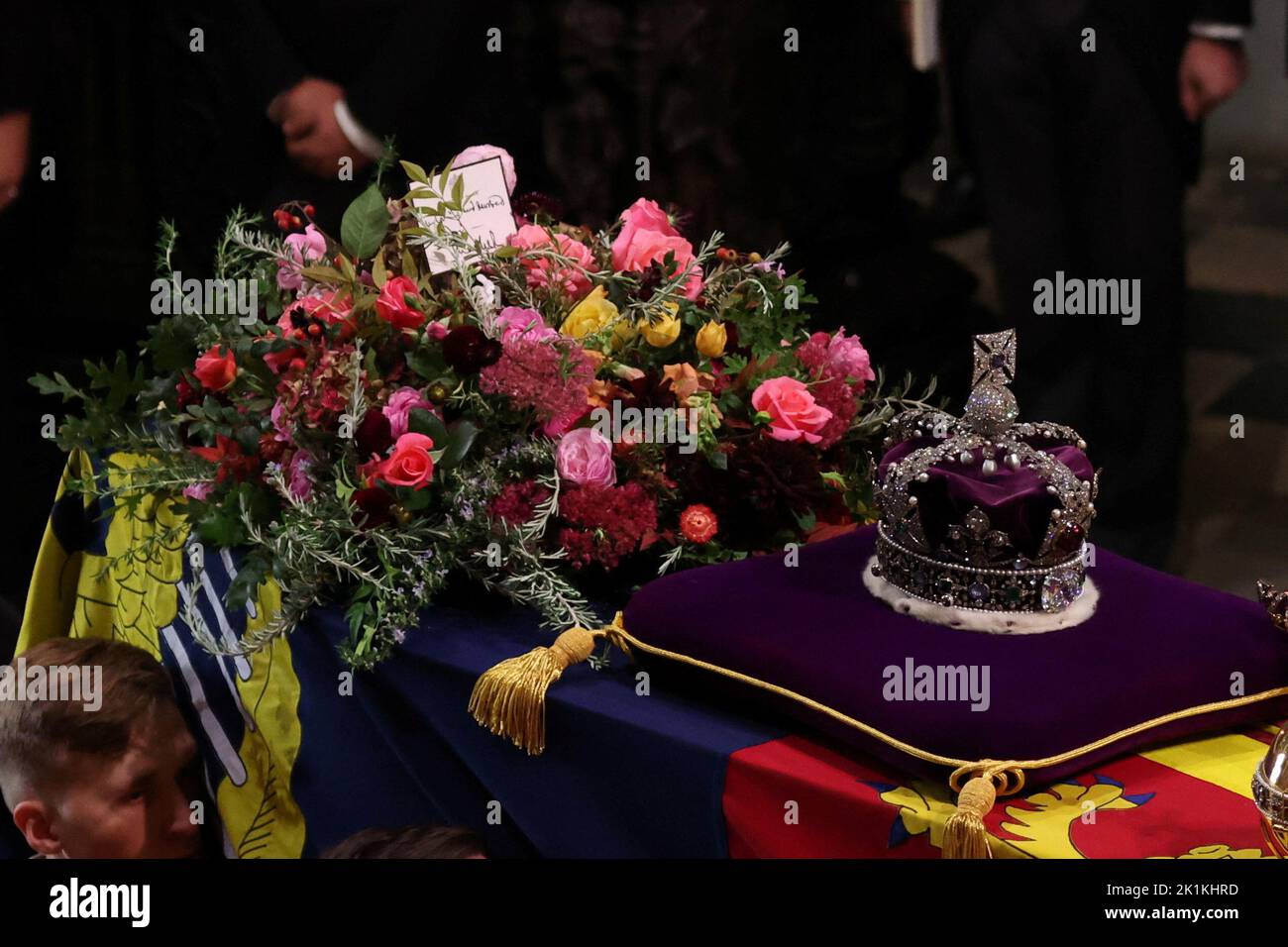 The coffin of Queen Elizabeth II with the Imperial State Crown and a ...