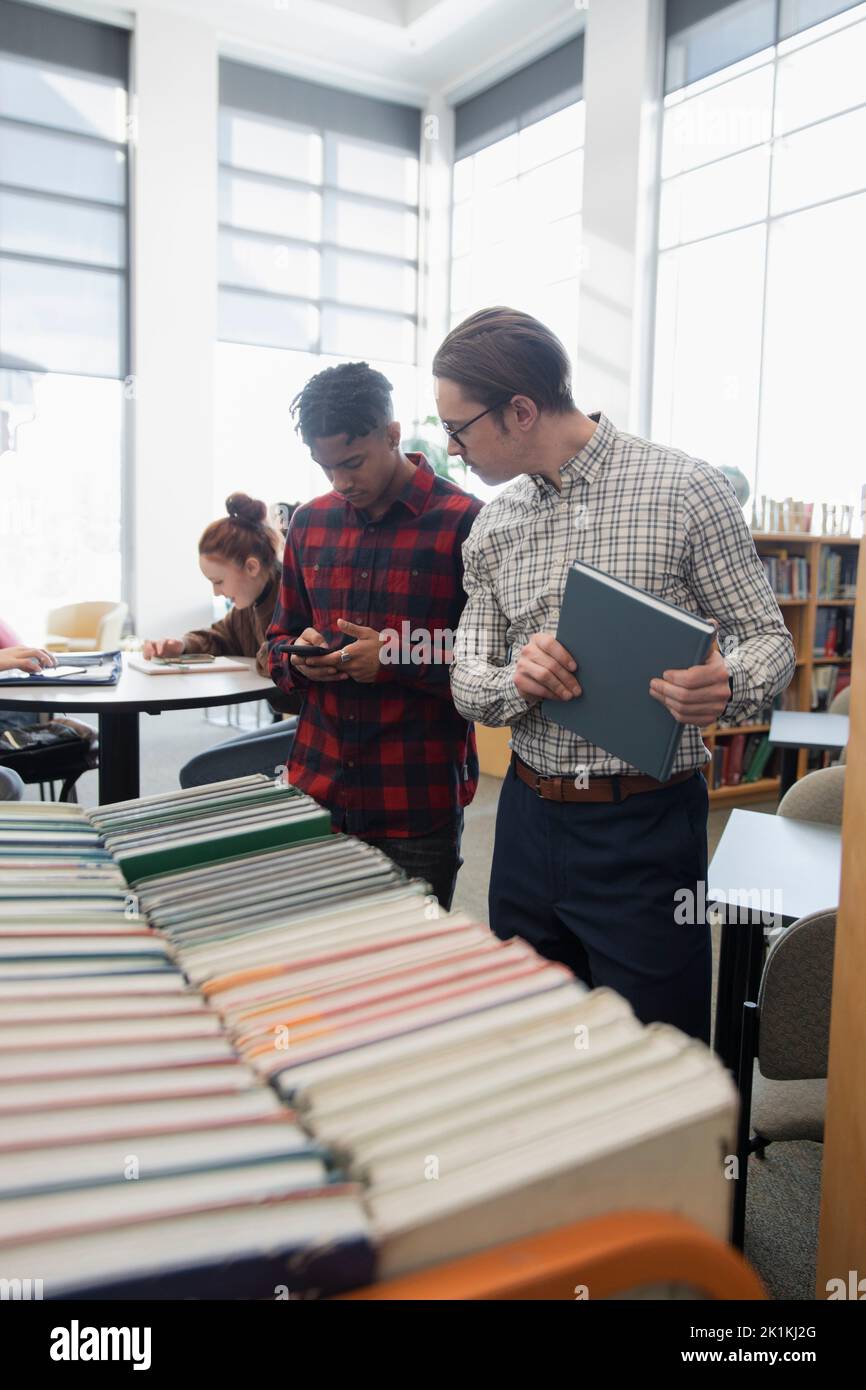 Boy study books library hi-res stock photography and images - Alamy