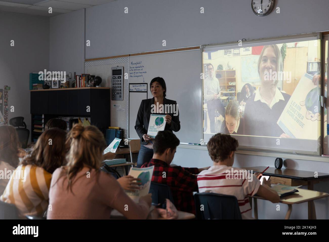 Teen asian watching video hi-res stock photography and images - Alamy