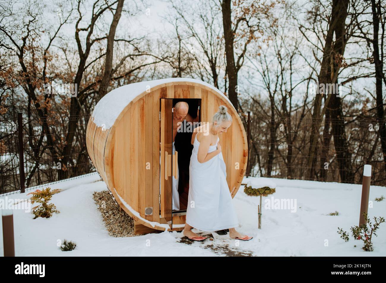 Woman coming out of sauna hi-res stock photography and images - Alamy
