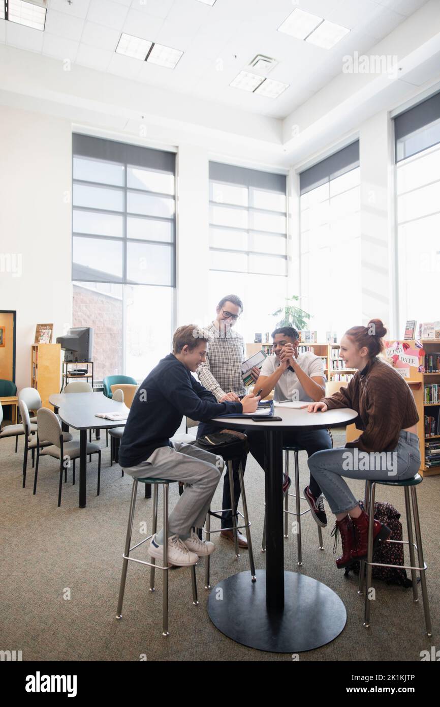 Student librarian talking hi-res stock photography and images - Alamy