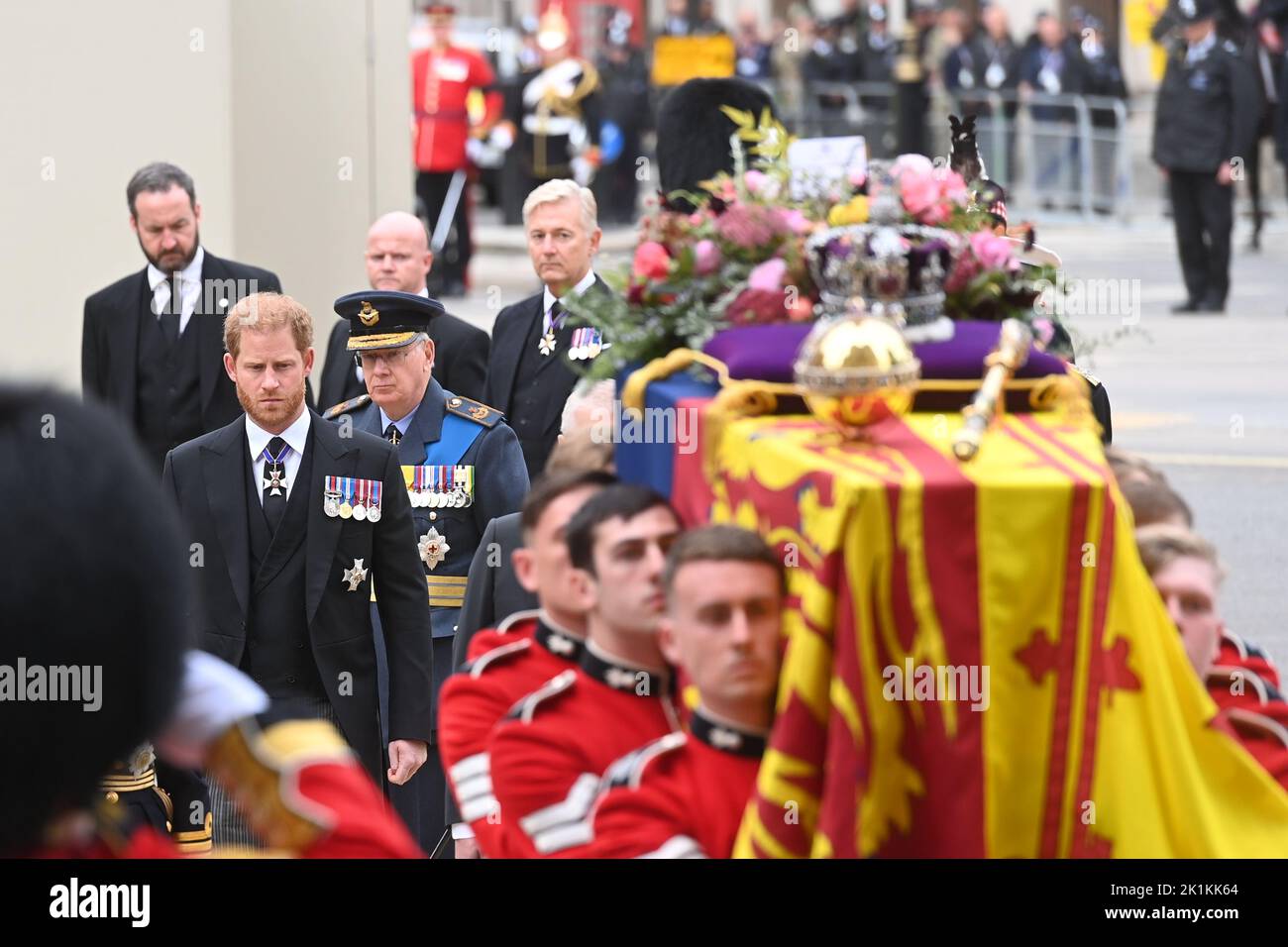The Duke of Sussex watches as the coffin carrying Queen Elizabeth II ...