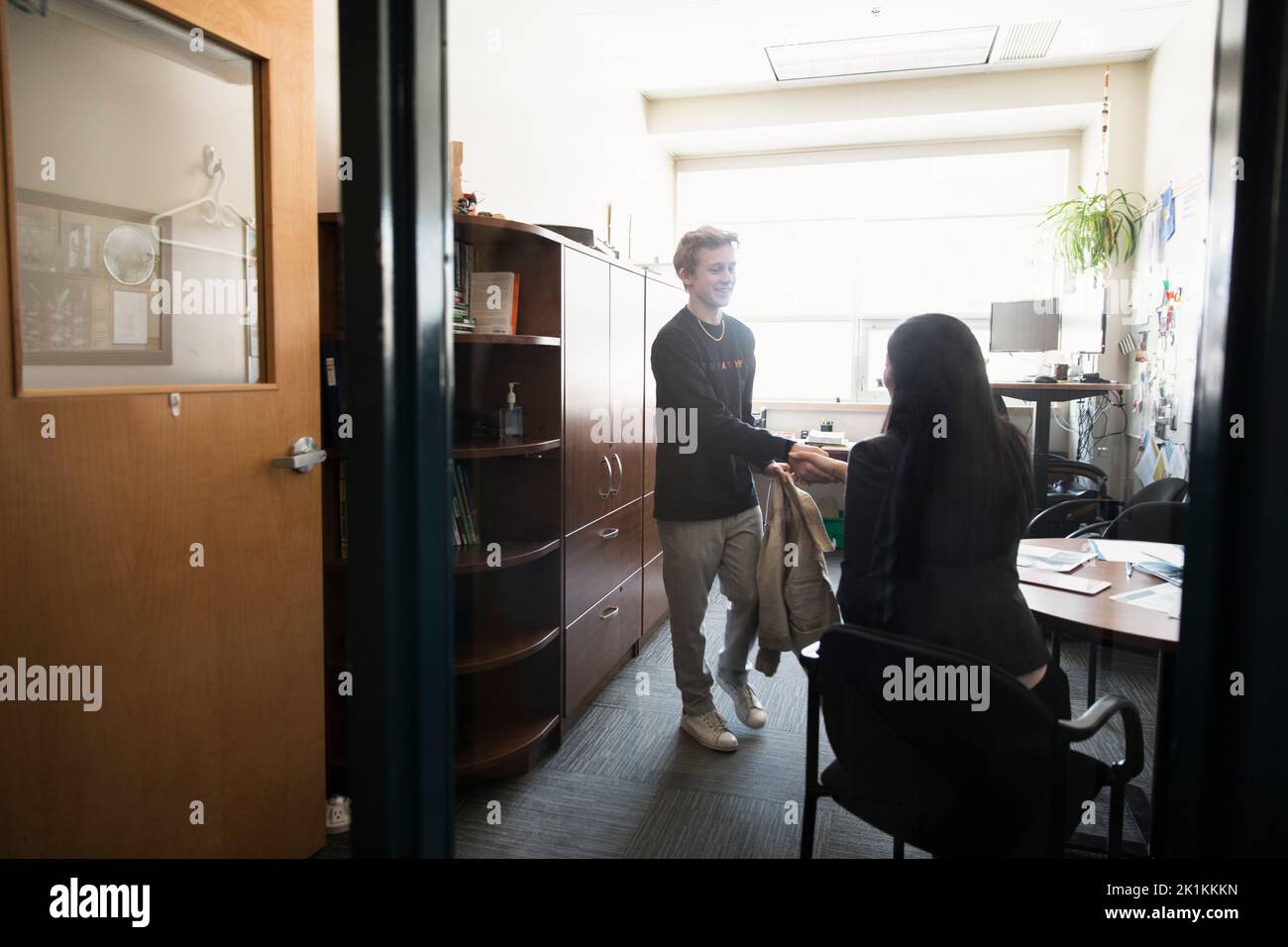 Handshake adult school child hi-res stock photography and images - Alamy