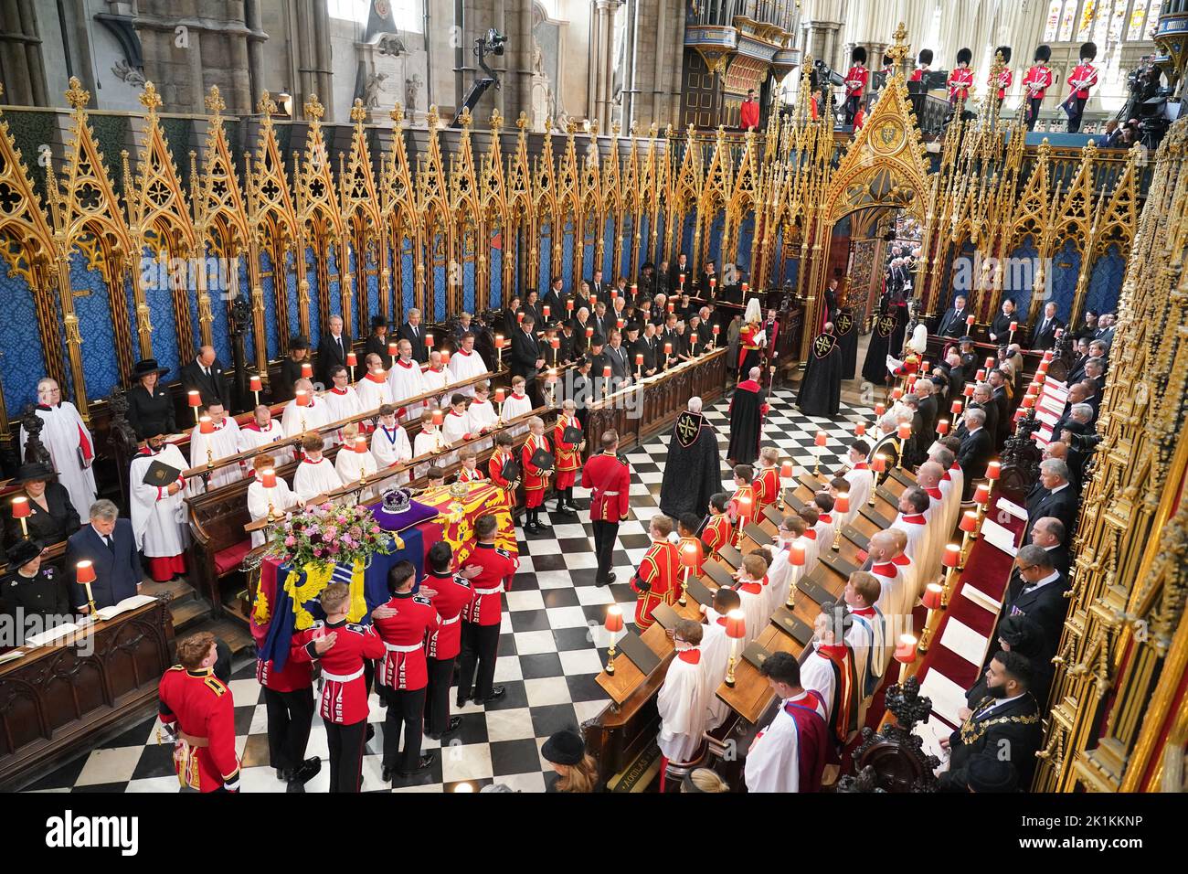 The coffin of Queen Elizabeth II, draped in the Royal Standard with the ...