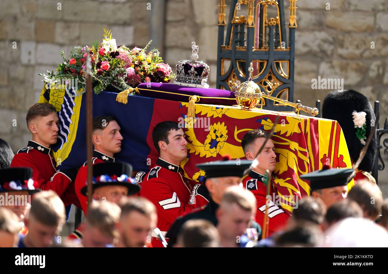 The coffin of Queen Elizabeth II, draped in the Royal Standard with the ...