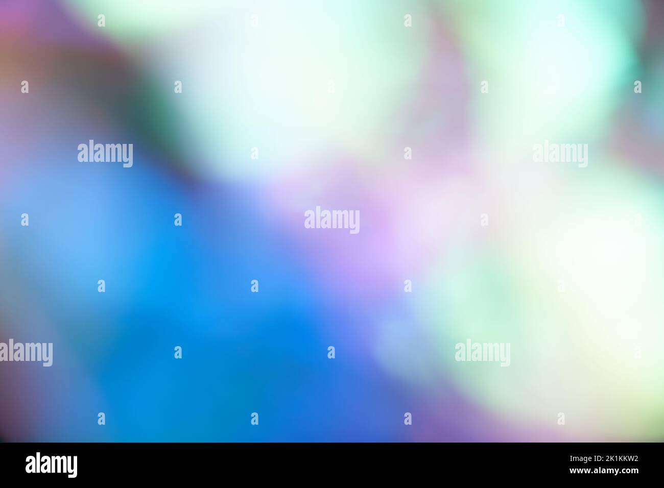 Unfocused holographic colors of mother-of-pearl foil. Blurry ...
