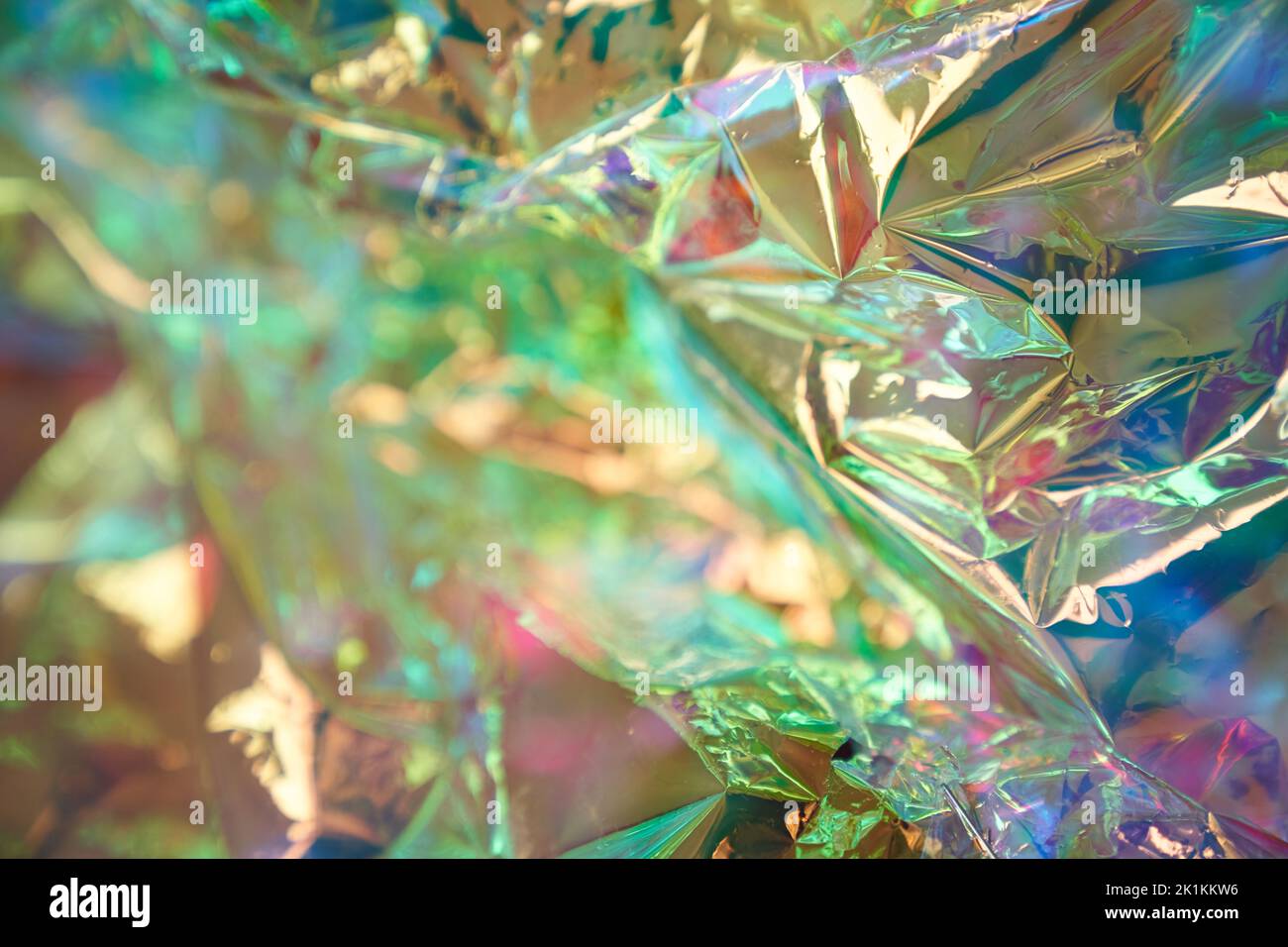 Holographic colored wrinkled mother-of-pearl foil. Holographic texture ...