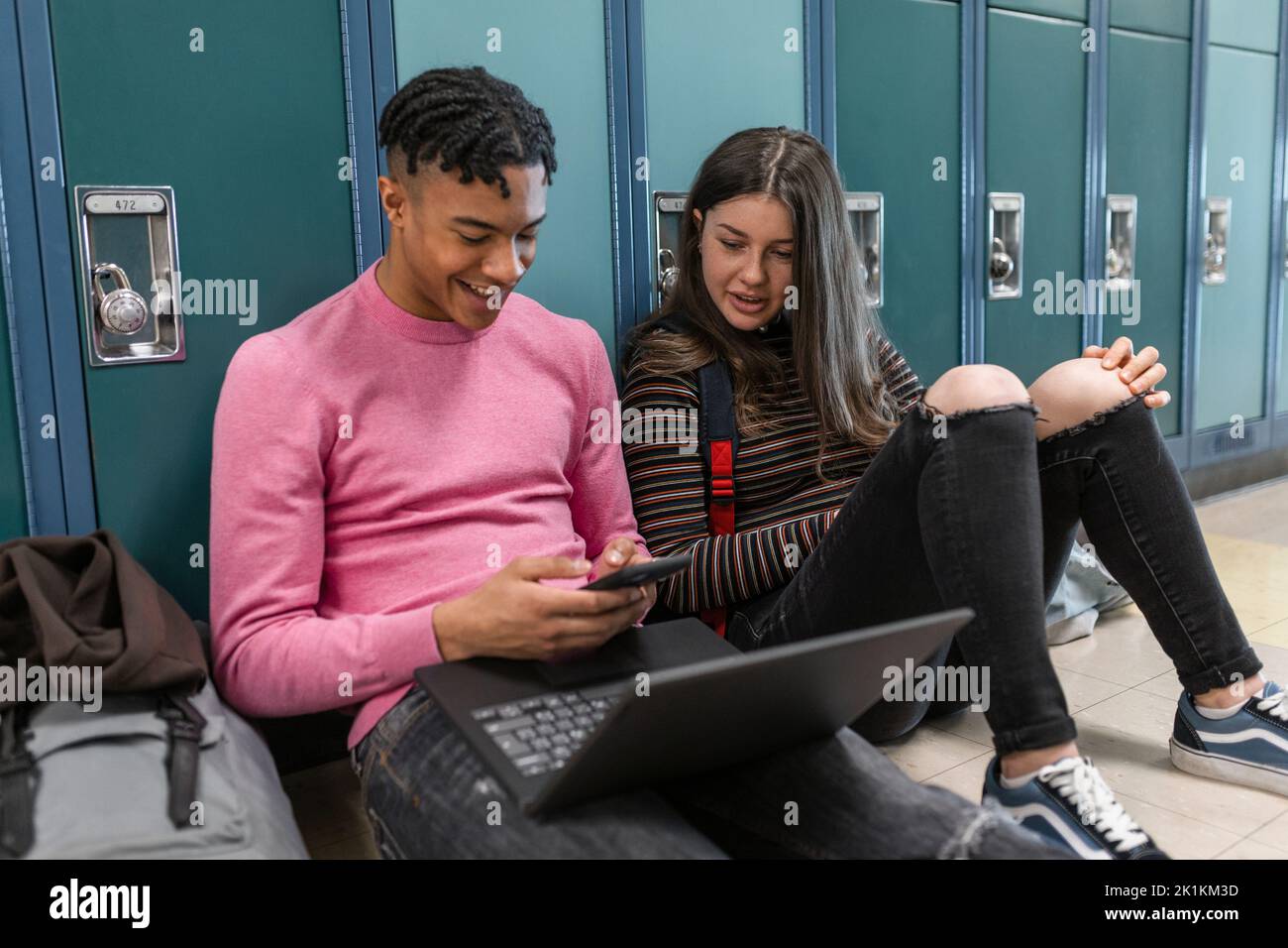 Two boys using laptop school hi-res stock photography and images - Alamy