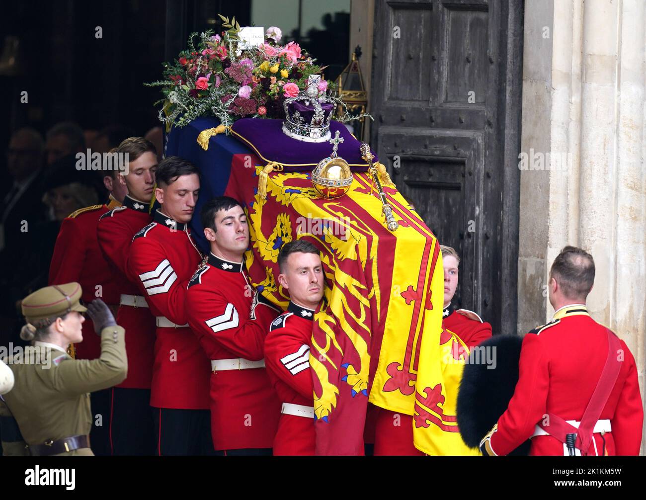 The coffin of Queen Elizabeth II, draped in the Royal Standard with the ...