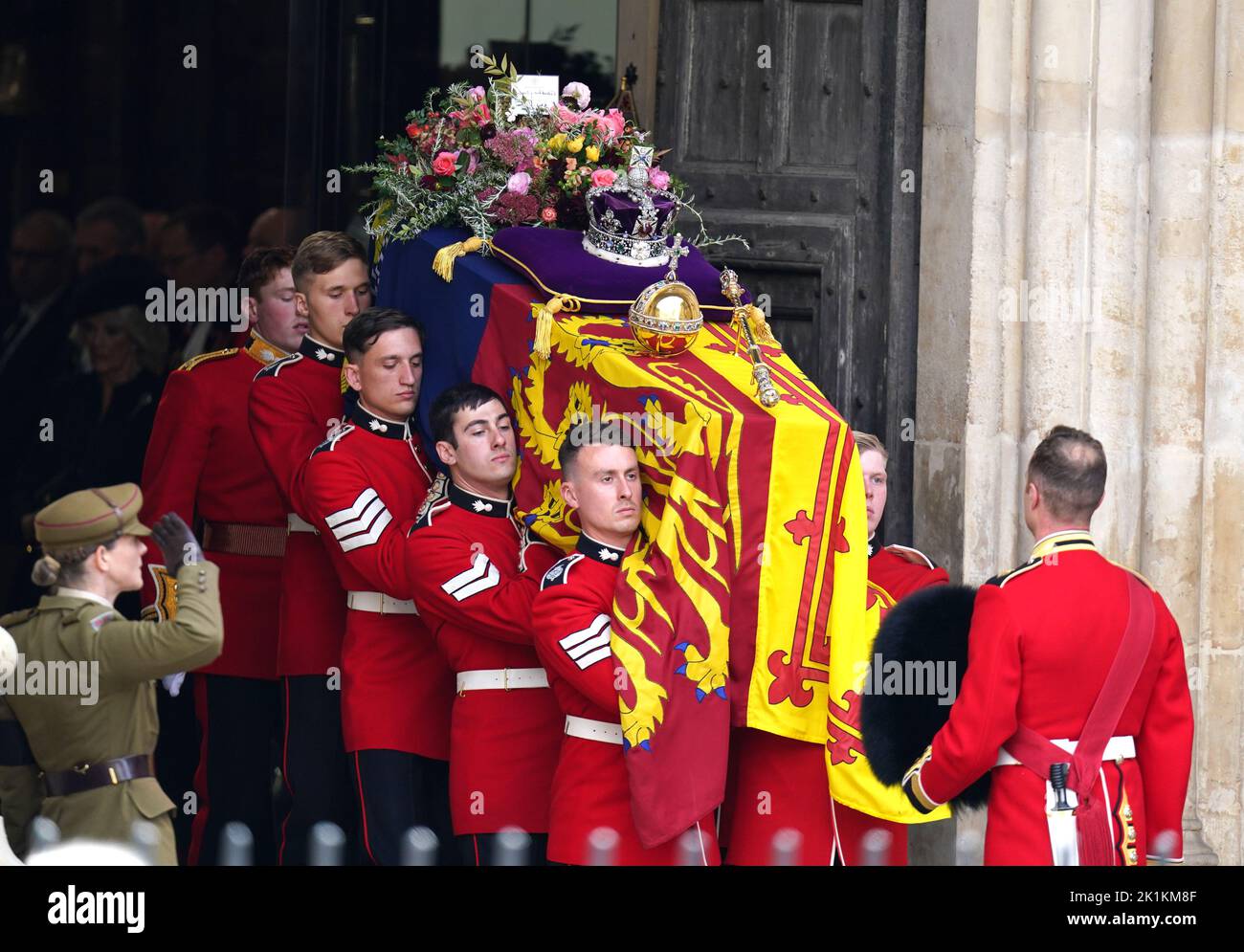 The coffin of Queen Elizabeth II, draped in the Royal Standard with the ...