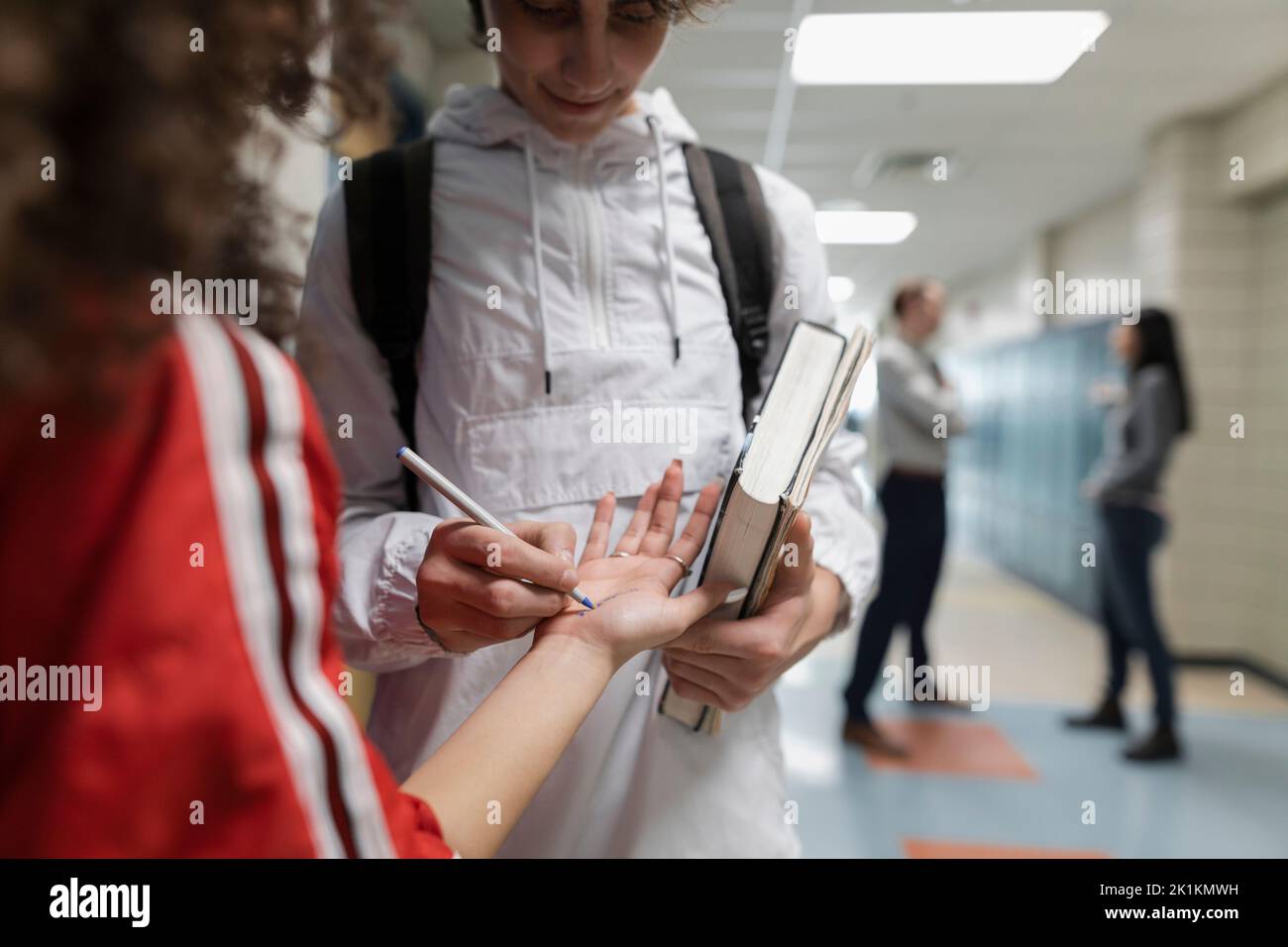 Teen hand writing hi-res stock photography and images - Alamy