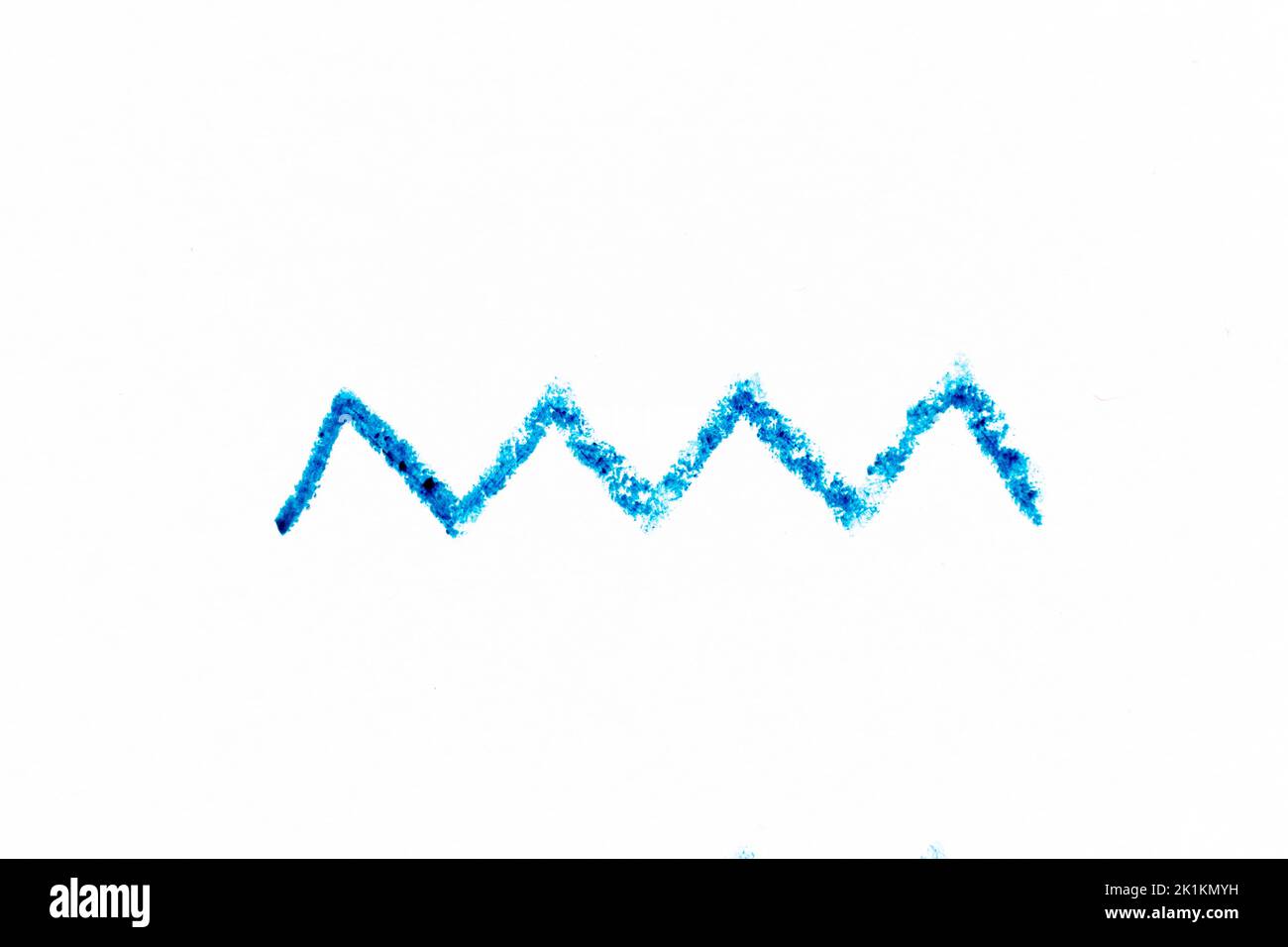 Blue color crayon hand drawing in zigzag line shape on white paper ...