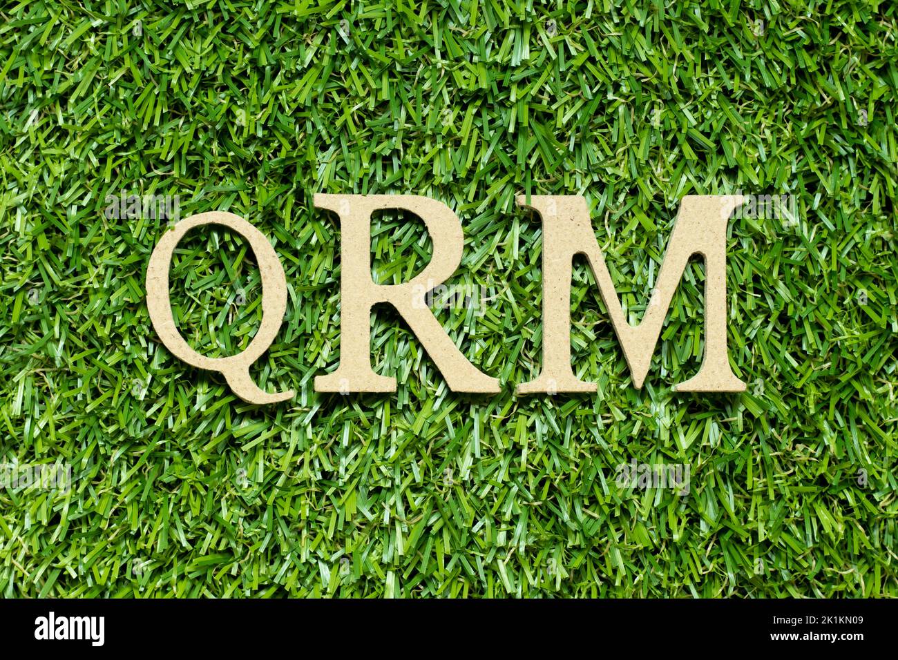 Wood alphabet letter in word QRM (Abbreviation of Quality Risk ...