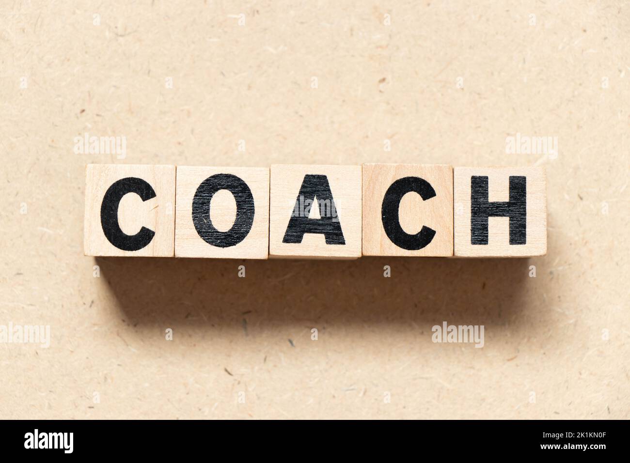 Alphabet letter block in word coach on wood background Stock Photo - Alamy