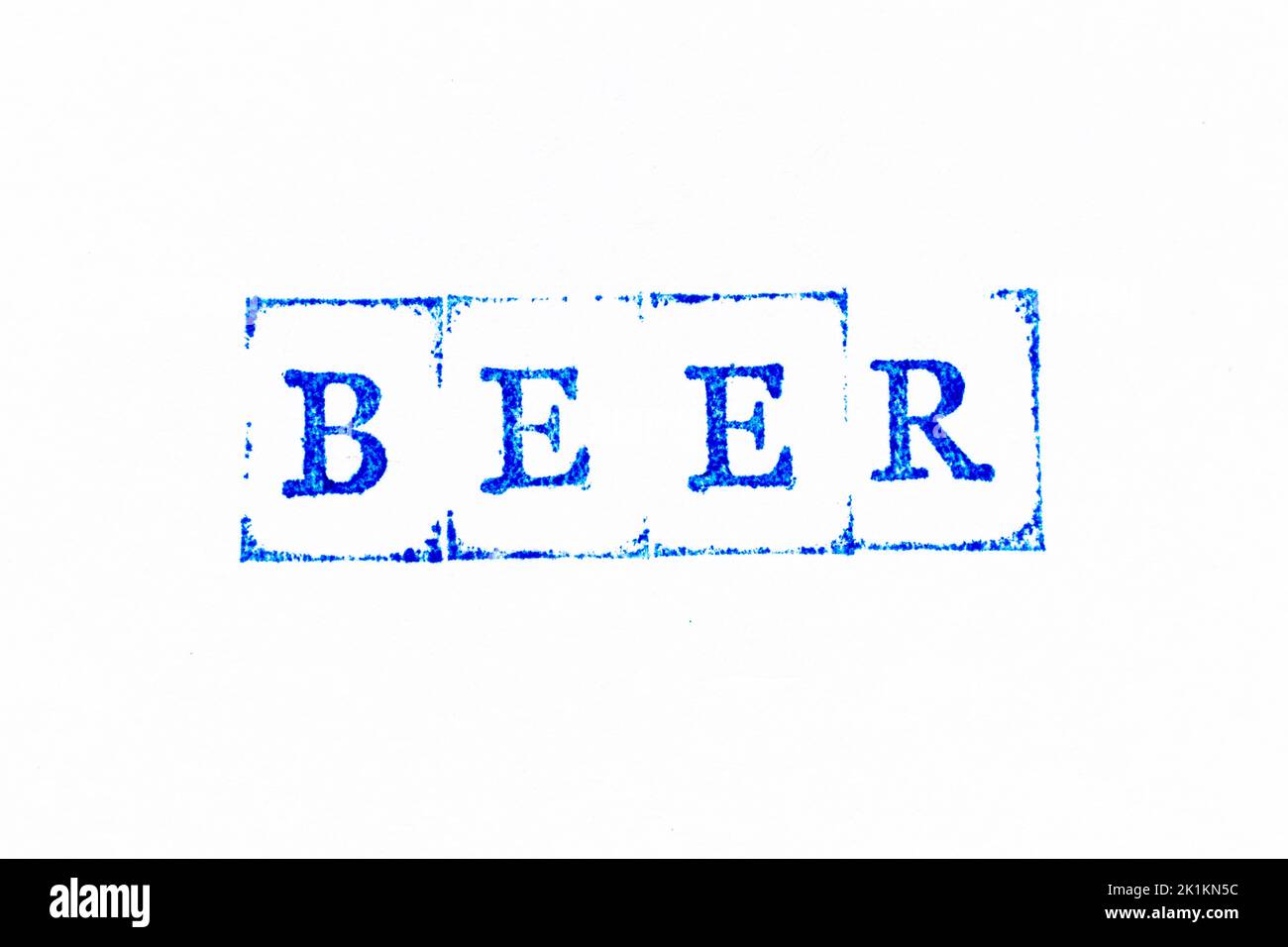 Blue color ink rubber stamp in word beer on white paper background ...