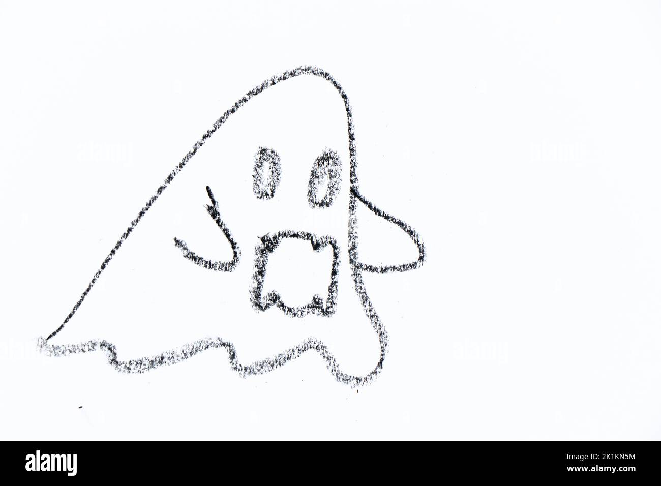 Black color oil pastel hand drawing in flying ghost shape on white ...