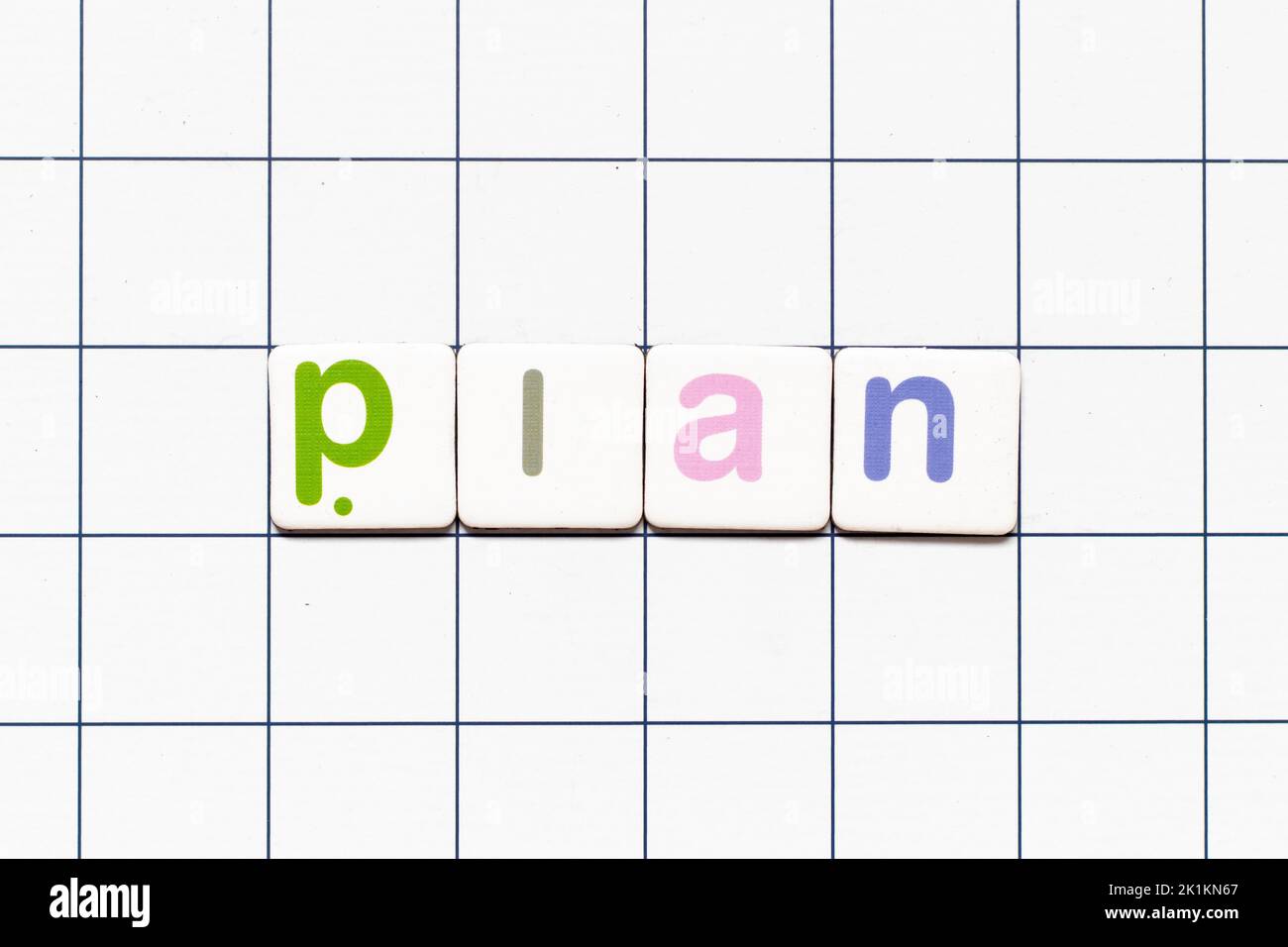 Colorful tile letter in word plan on white grid background Stock Photo ...
