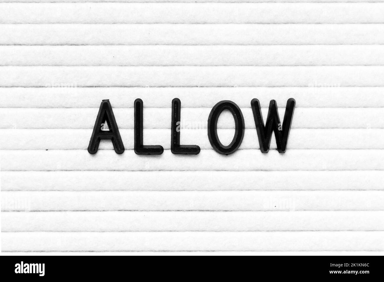 Black color letter in word allow on white felt board background Stock ...