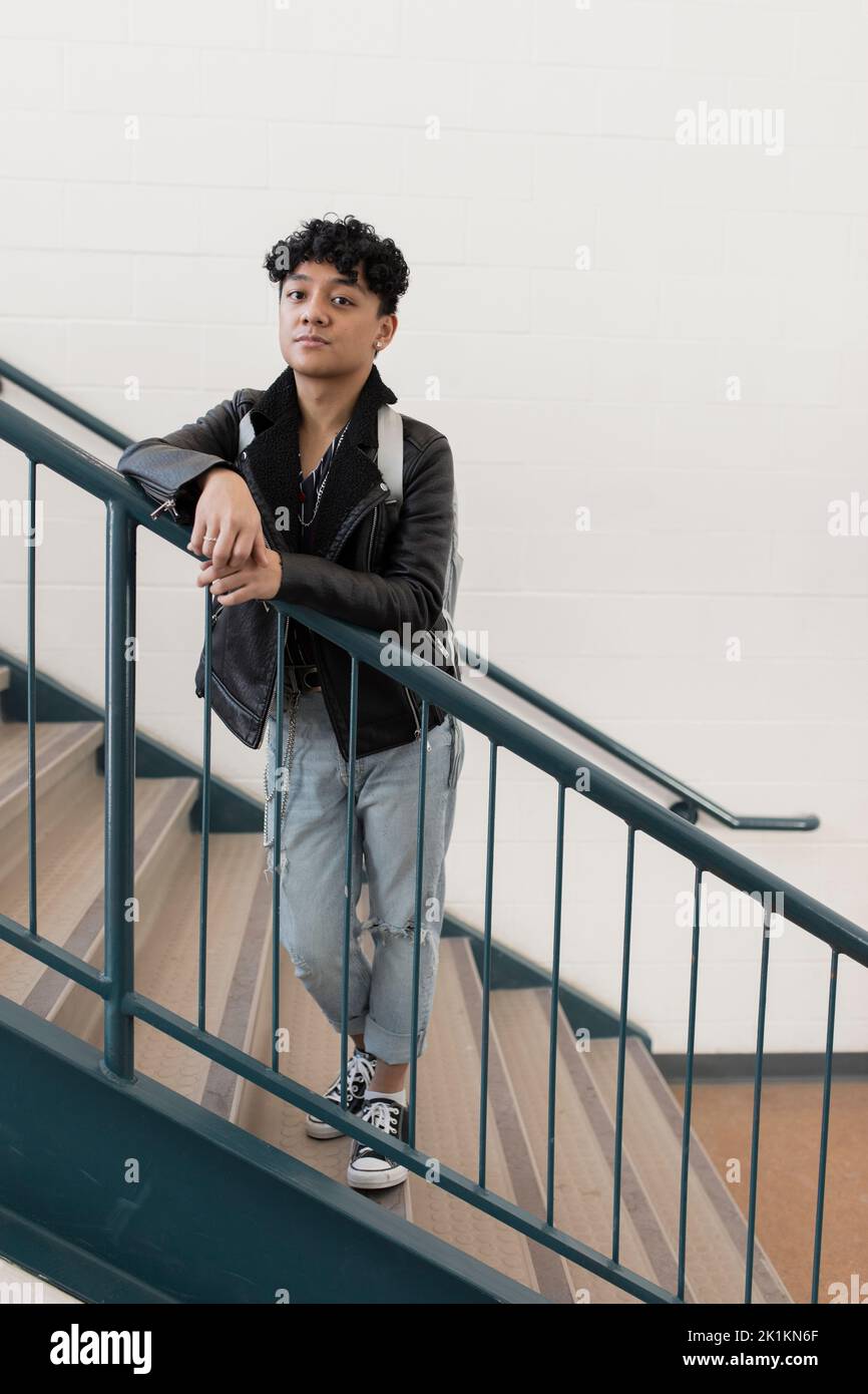 Black high school teen boy full length hi-res stock photography and ...