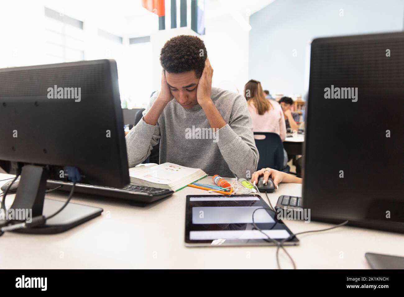 Boy on computer studying school hi-res stock photography and images - Alamy