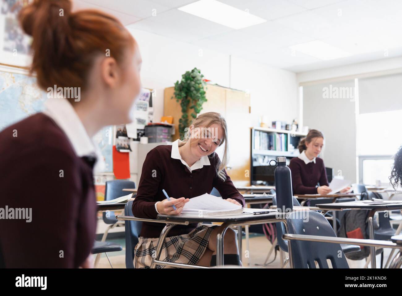 Girls in school uniform studying hi-res stock photography and images ...