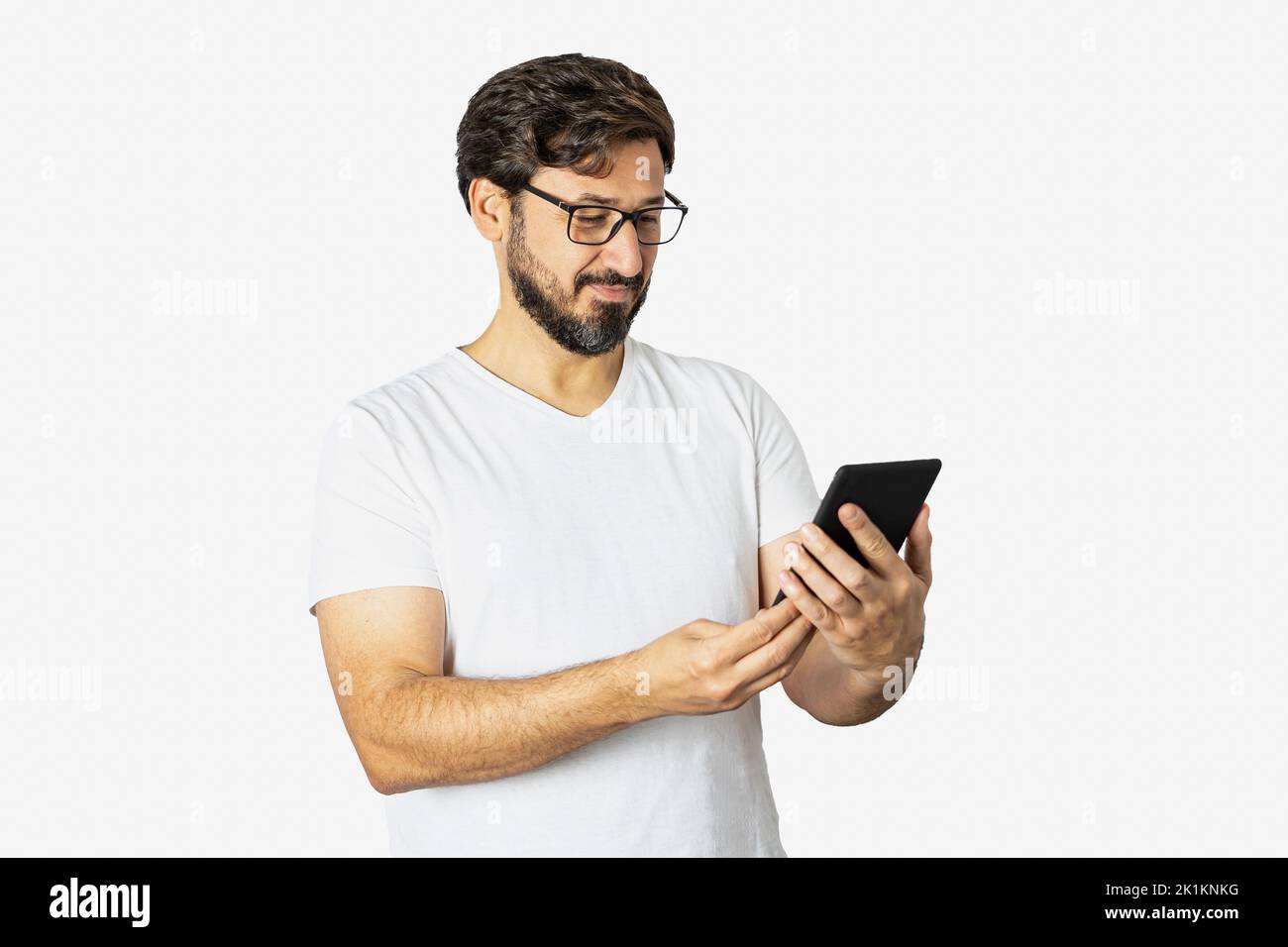 Horizontal portrait of a man with beard and white t-shirt standing ...