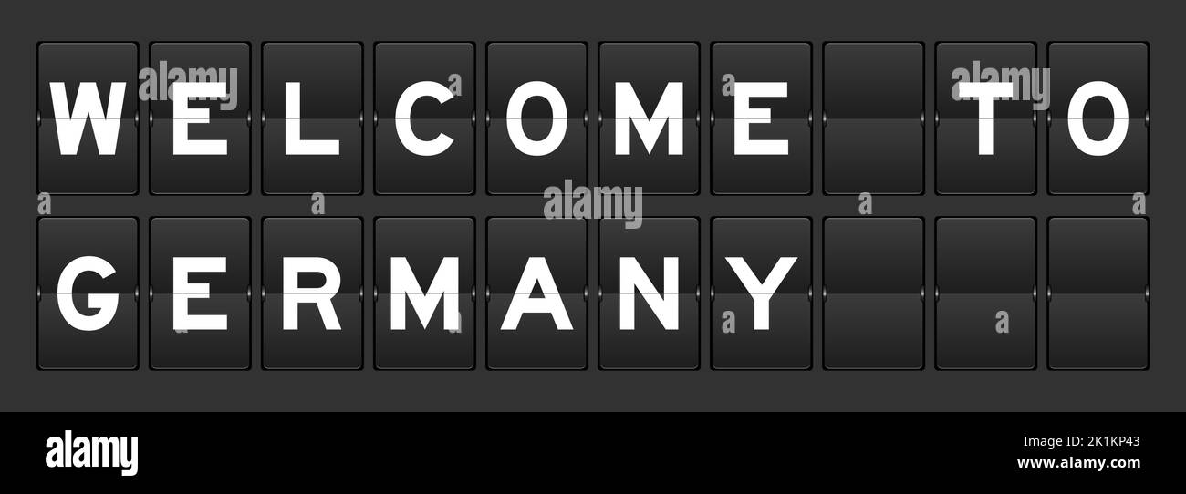 Black color analog flip board with word welcome to germany on gray ...