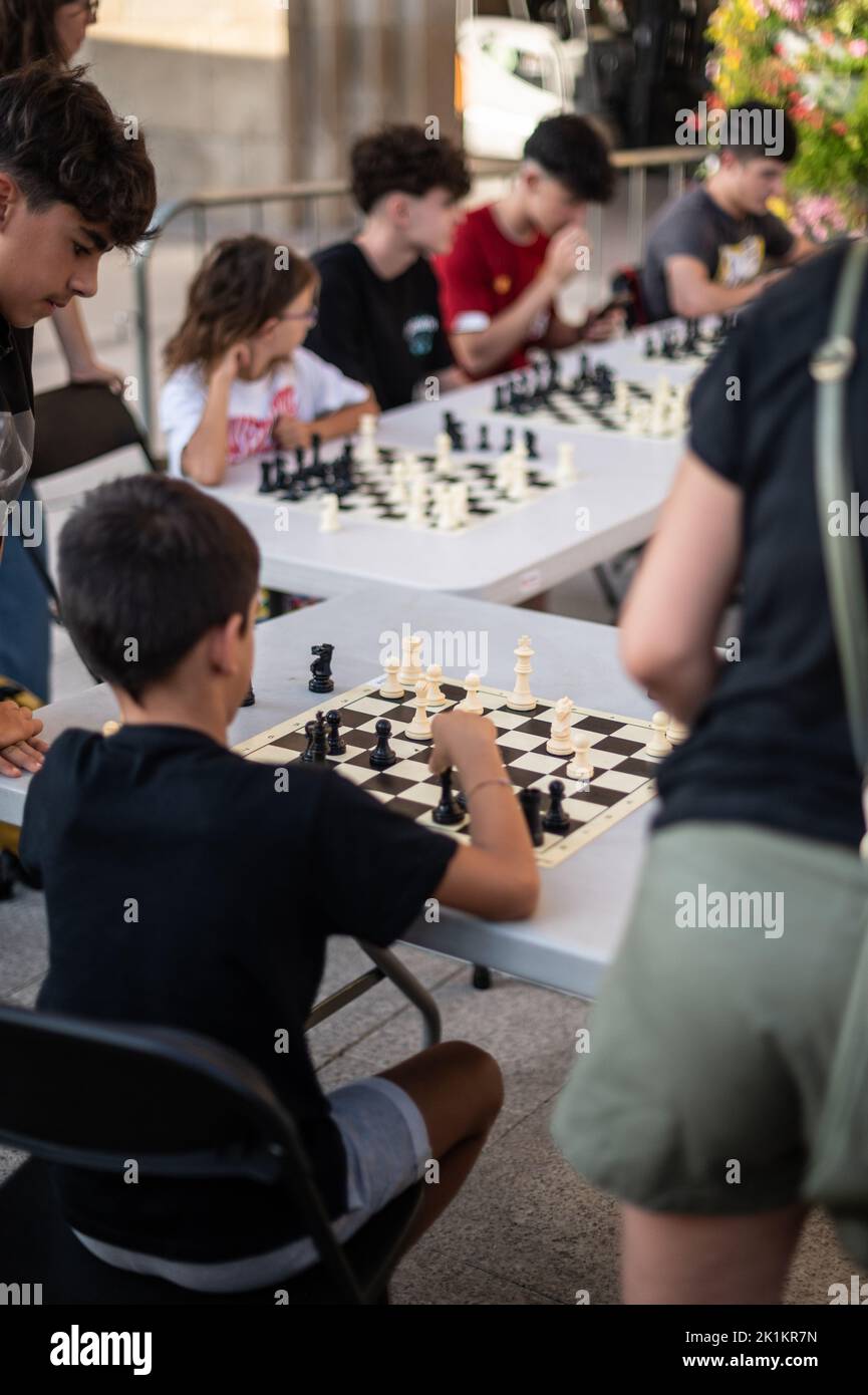 Kids play chess at Sports Day multi-sports street event in Plaza del ...