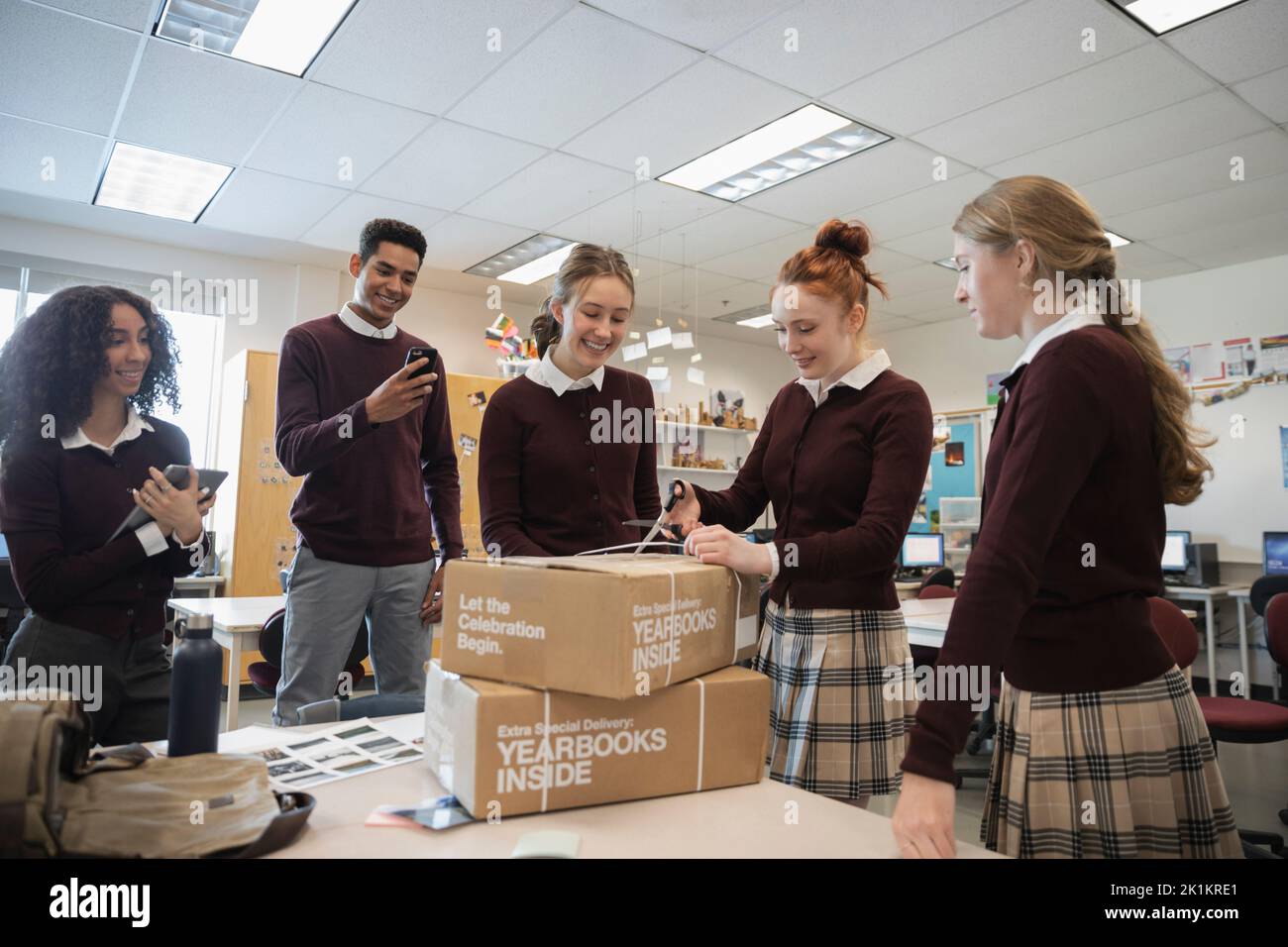 Excited school girl in uniform hi-res stock photography and images - Alamy