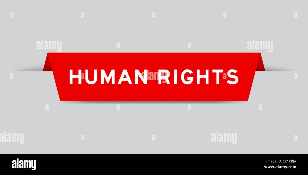 Red color inserted label with word human rights on gray background ...