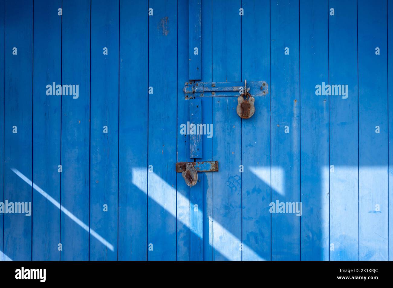 Distressed blue painted wooden door hi-res stock photography and images ...