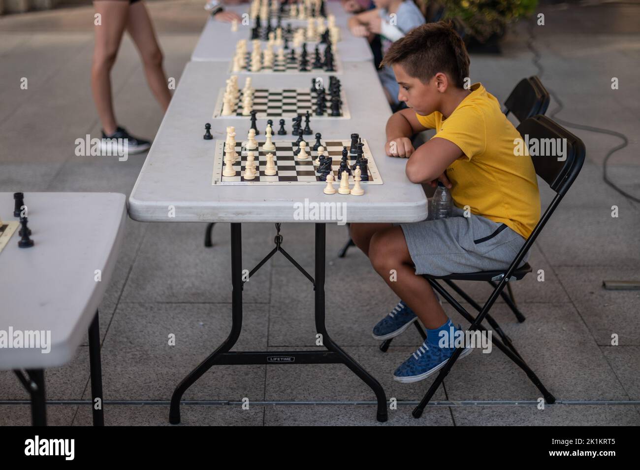Kids play chess at Sports Day multi-sports street event in Plaza del ...