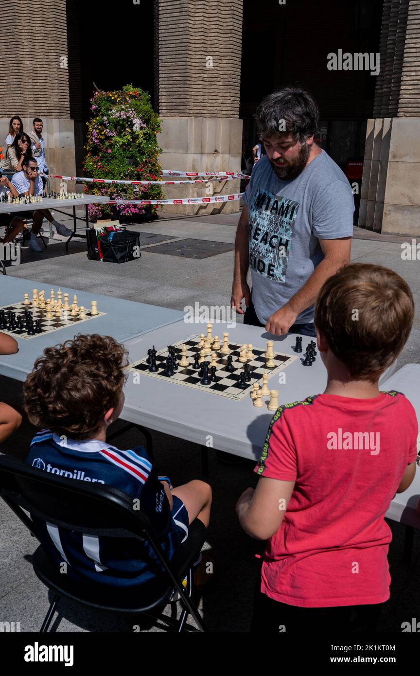 Kids play chess at Sports Day multi-sports street event in Plaza del ...