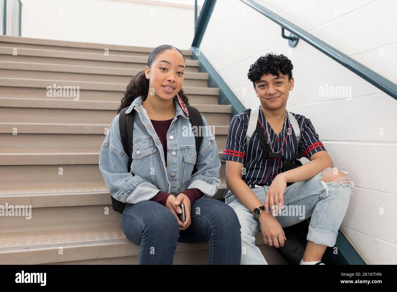 Boy on school steps hi-res stock photography and images - Alamy