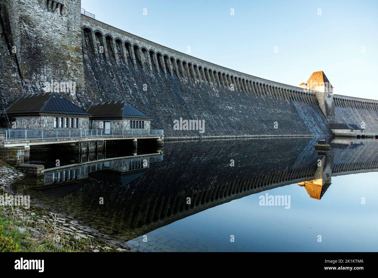 Dam wall Möhnetalsperre with the slider houses at the compensation pond ...
