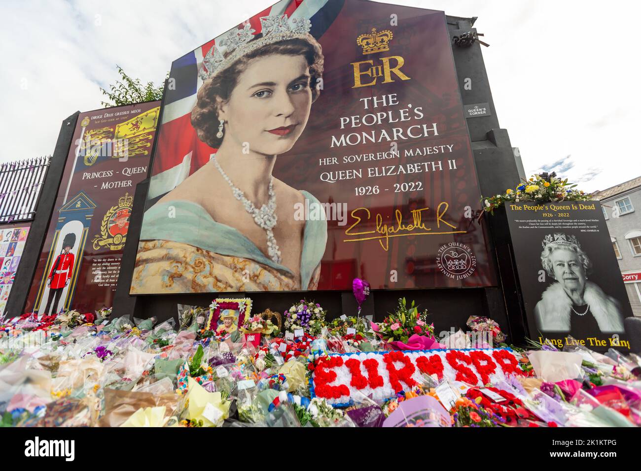 Belfast, UK. 19th Sep, 2022. Floral Tributes are left at a Mural of ...
