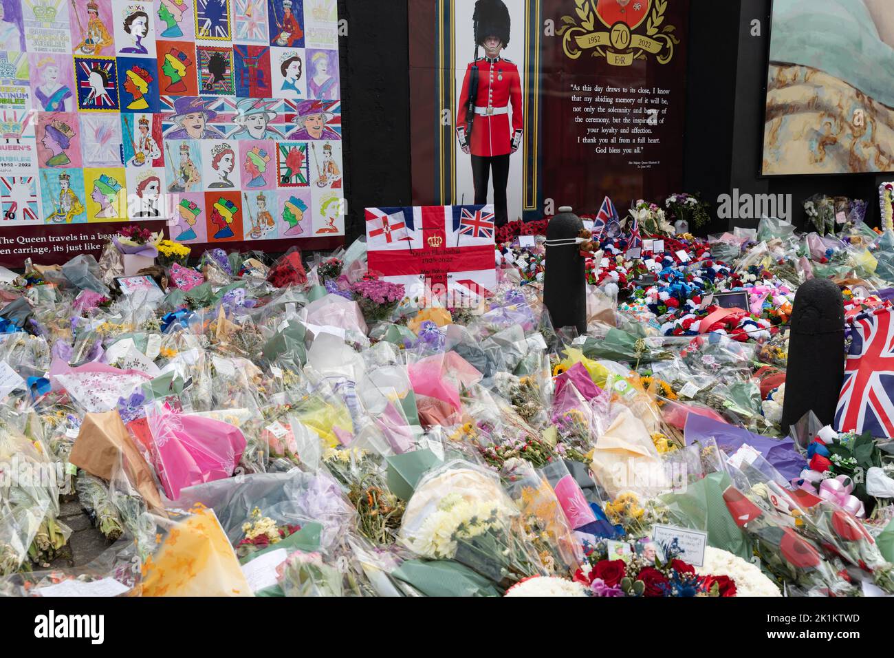 Belfast, UK. 19th Sep, 2022. Floral Tributes are left at a Mural of ...