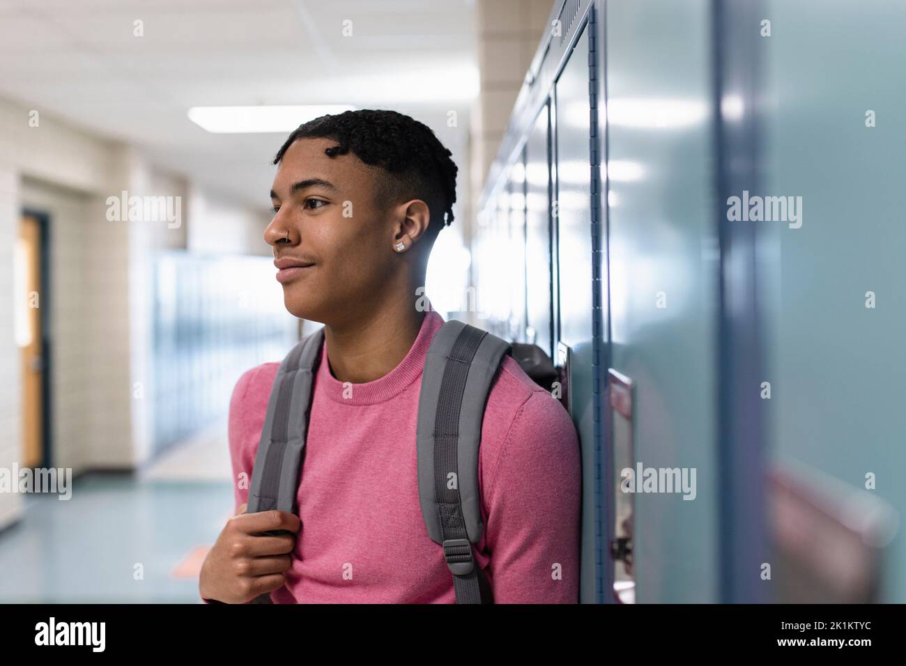 School teenager backpack lockers hi-res stock photography and images ...