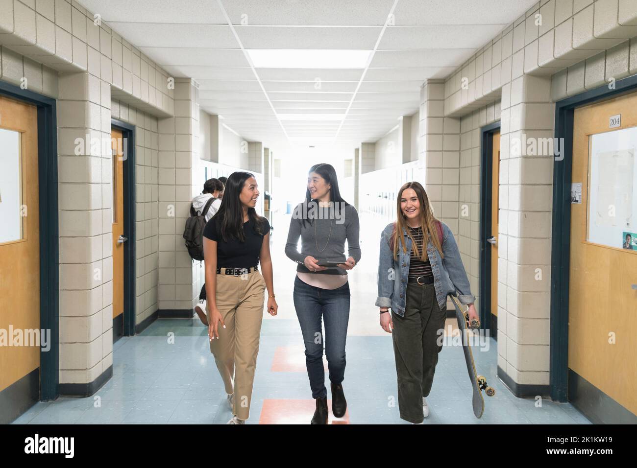 School Hallway With Students Talking