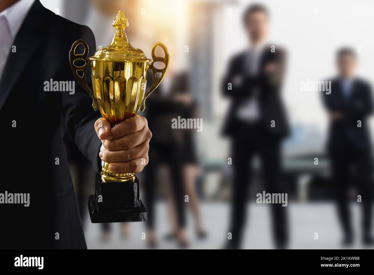 Team winning trophy hi-res stock photography and images - Alamy