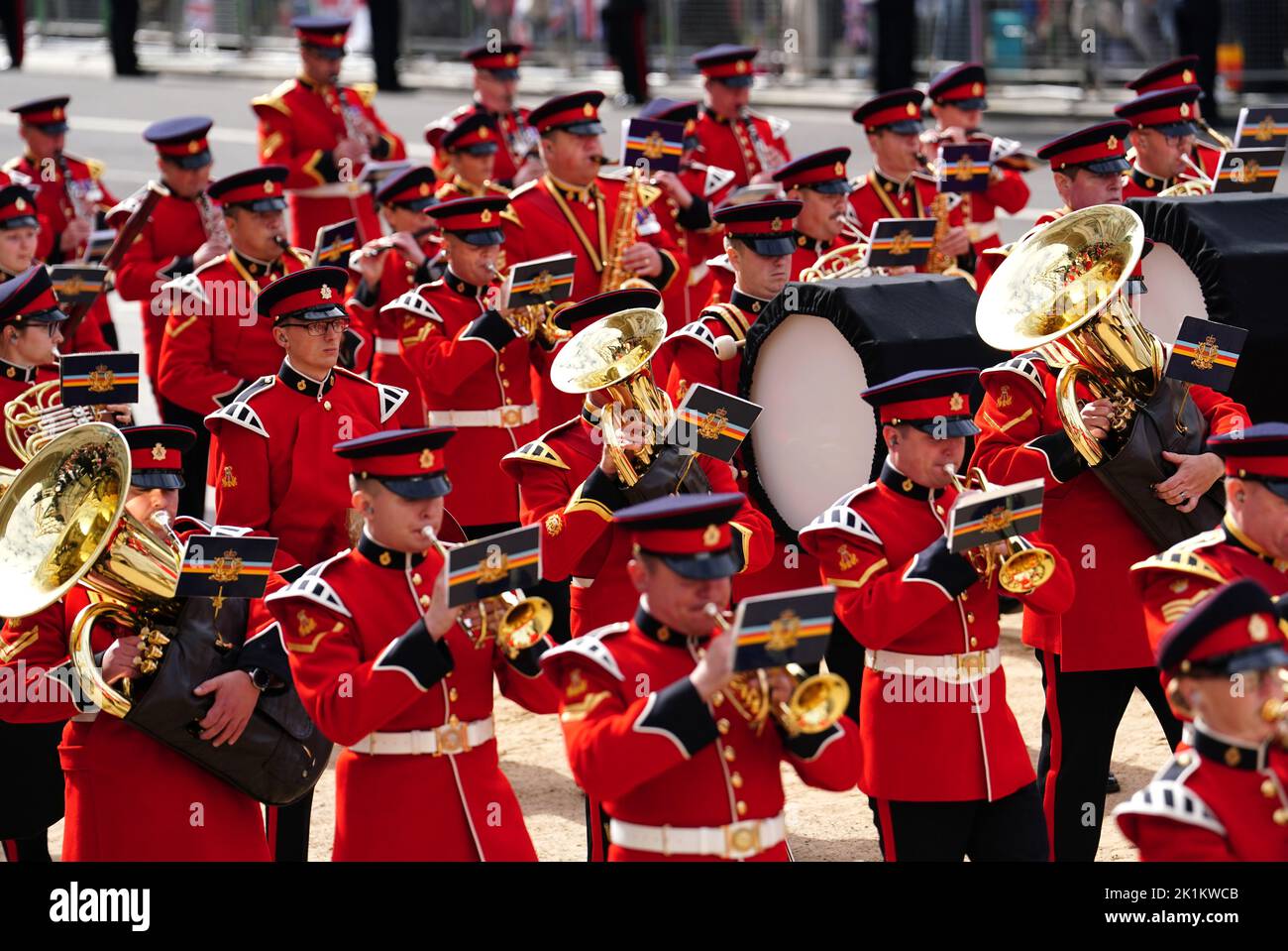 A marching band following the State Gun Carriage carrying the coffin of ...