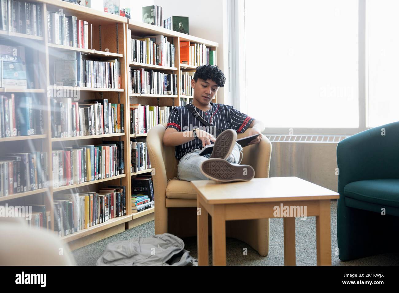 Boy book library hi-res stock photography and images - Alamy