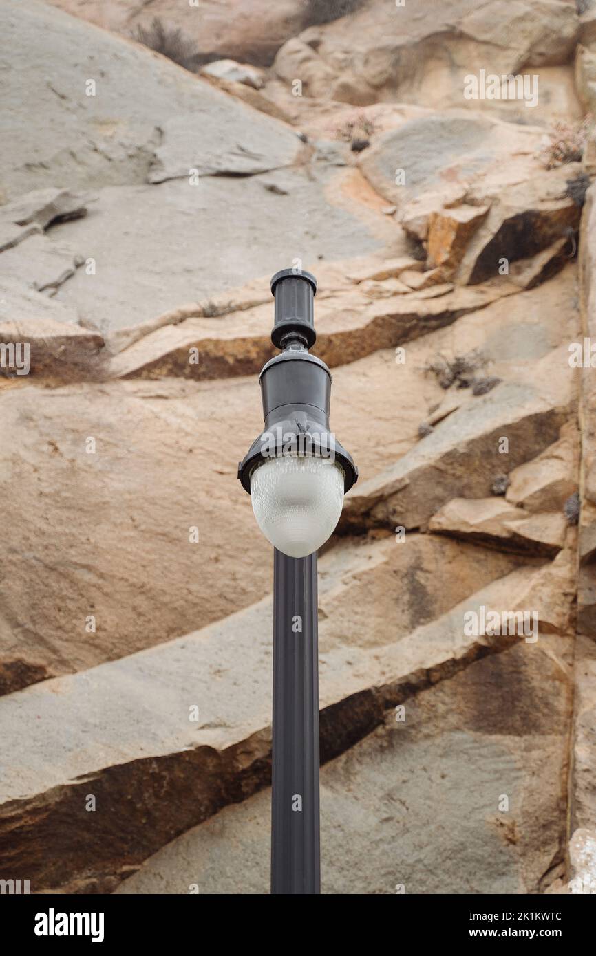 Street lamp off on volcanic rock background Morro Bay California ...