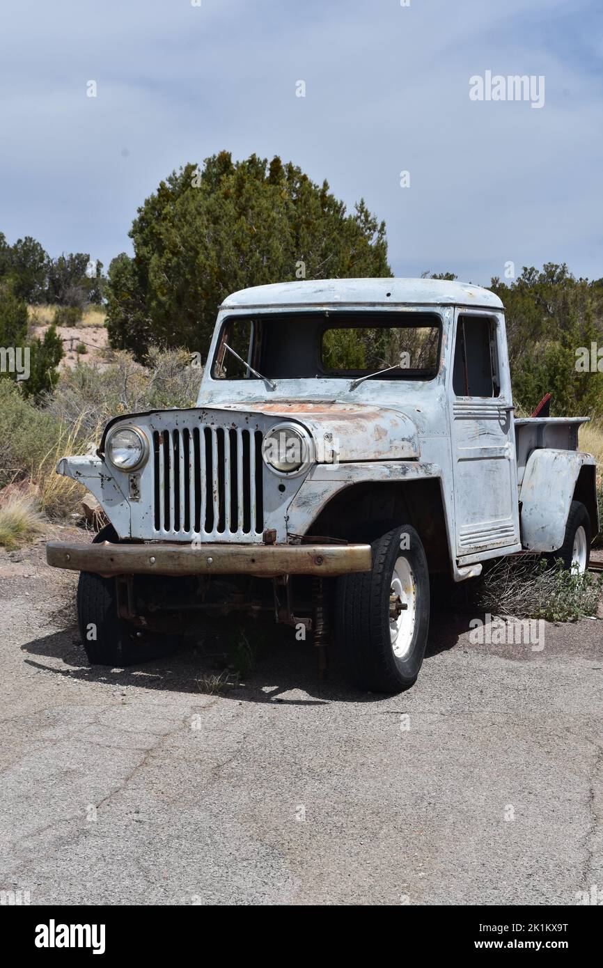Old fashioned light blue truck broken down in Arizona Stock Photo - Alamy