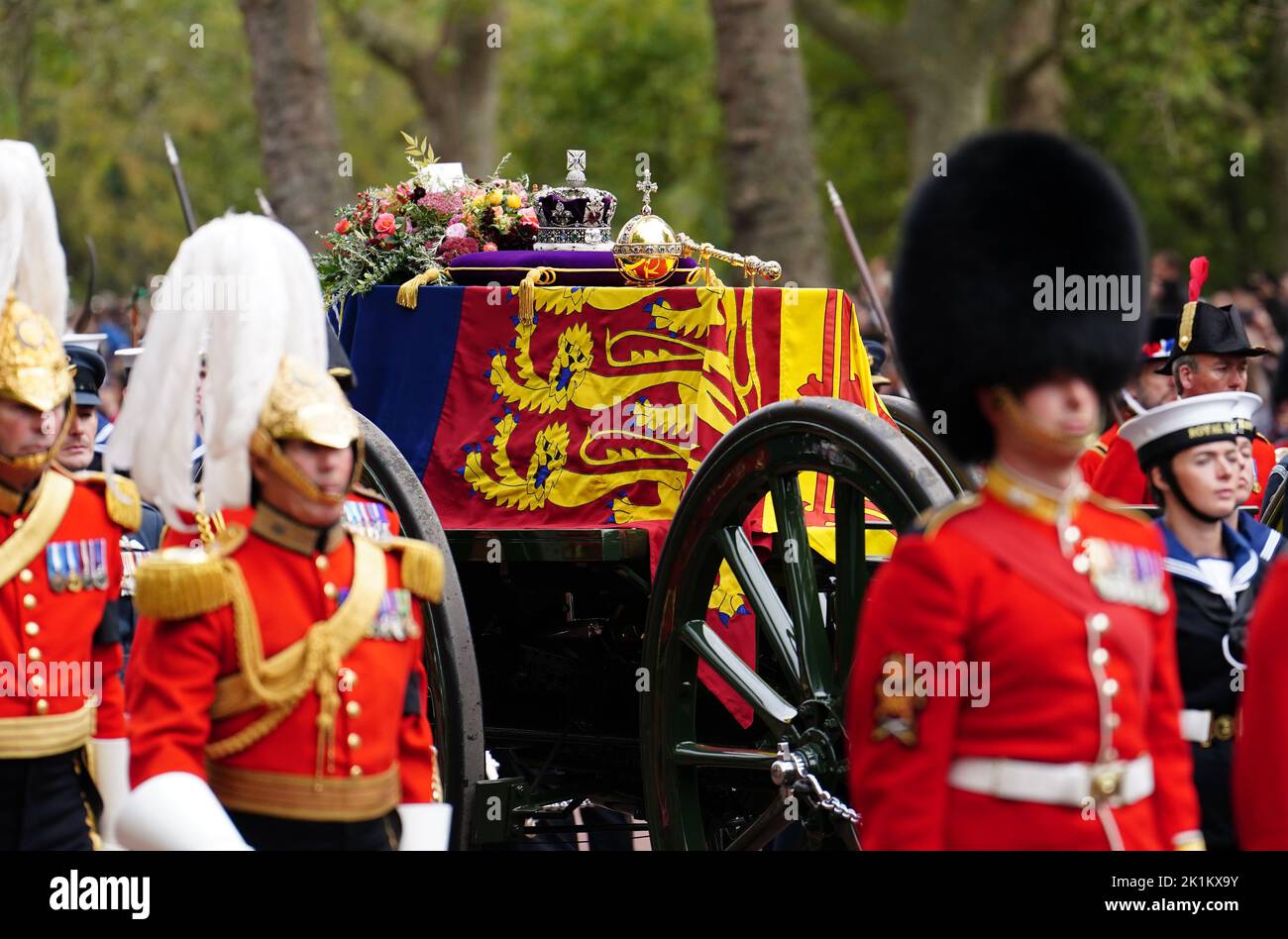 The State Gun Carriage carries the coffin of Queen Elizabeth II, draped ...
