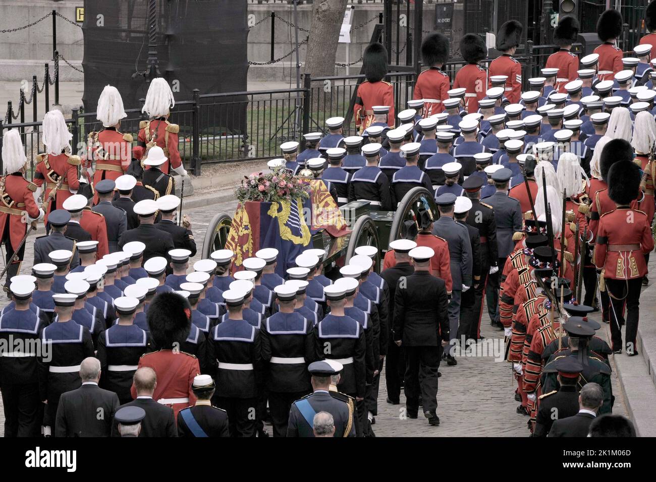 The coffin of Queen Elizabeth II is loaded on to a gun carriage pulled ...