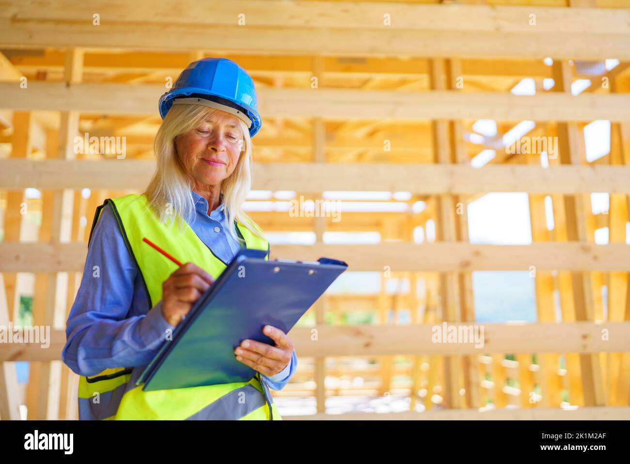 Engineer woman blueprints hi-res stock photography and images - Alamy