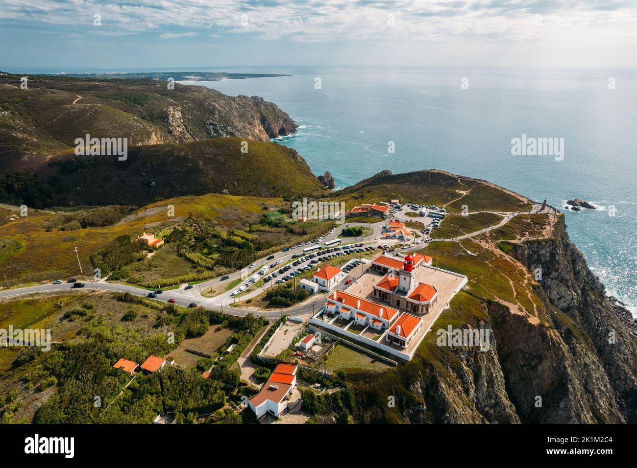 Aerial drone view of lighthouse at Cabo da Roca with unidentifiable ...