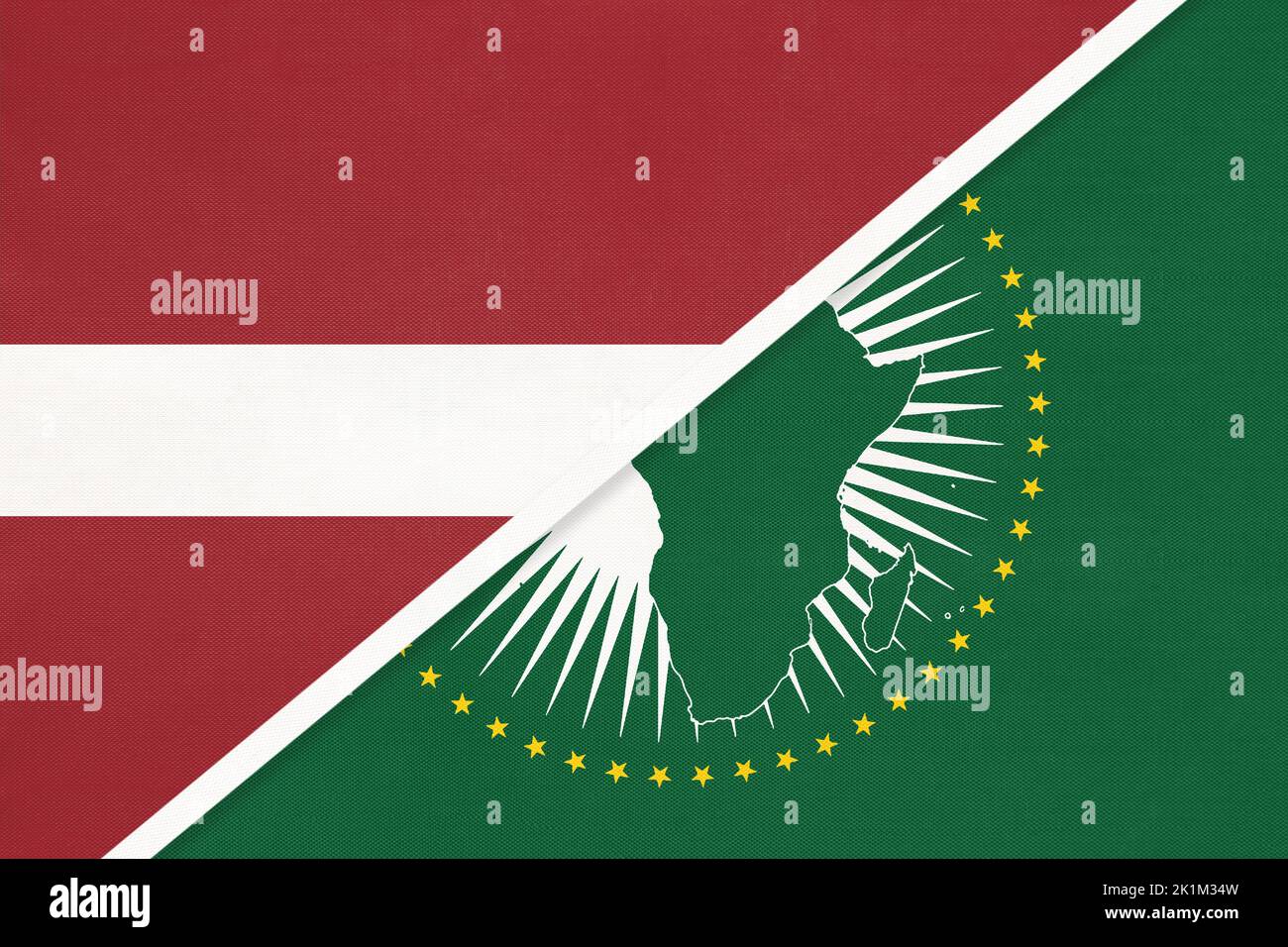 African Union and Latvia, national flag from textile. Africa continent ...
